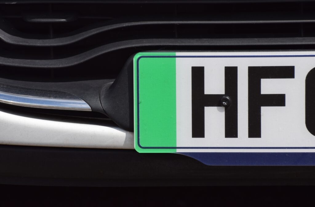 Why Do Electric Cars Have A Green Stripe On The Number Plate? | Motorway